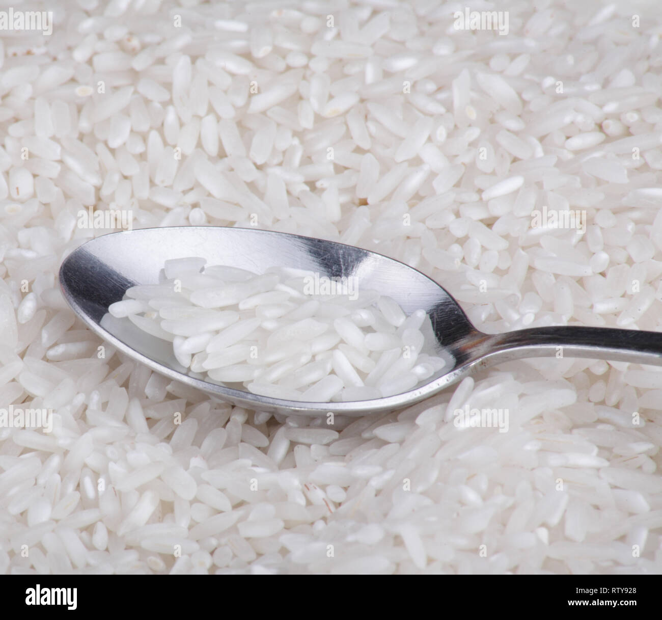 rice food background and teaspoon Stock Photo - Alamy