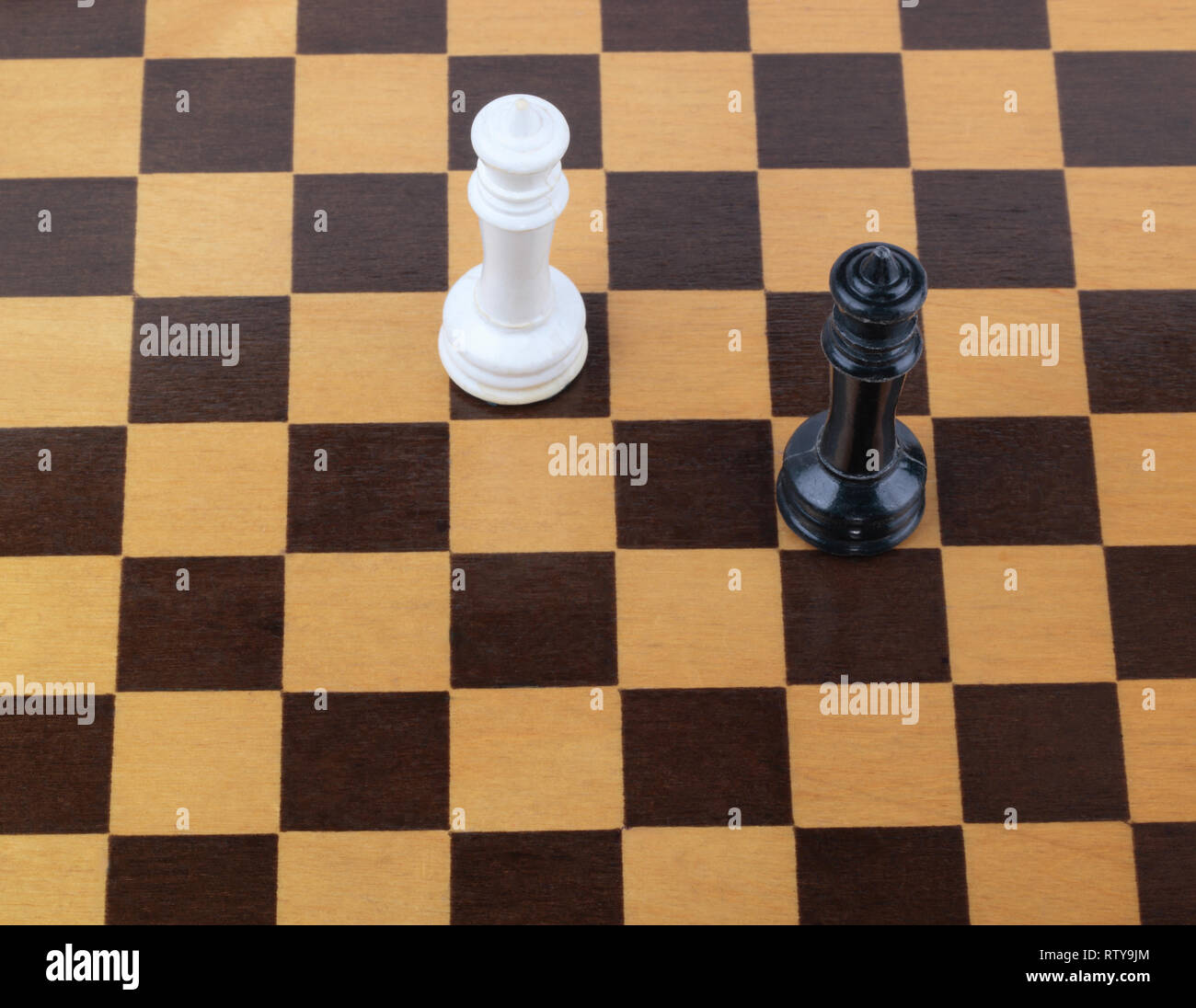 wooden checkerboard with figures Stock Photo - Alamy