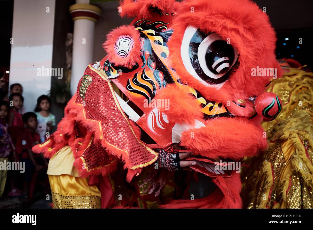 Dragon dancers usher in the new year by performing a dance ritual ...