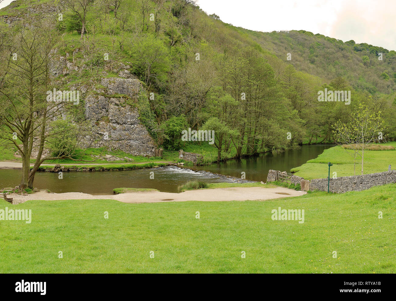 Stepping stones on river Dove at Dovedale in the Derbyshire Peak ...