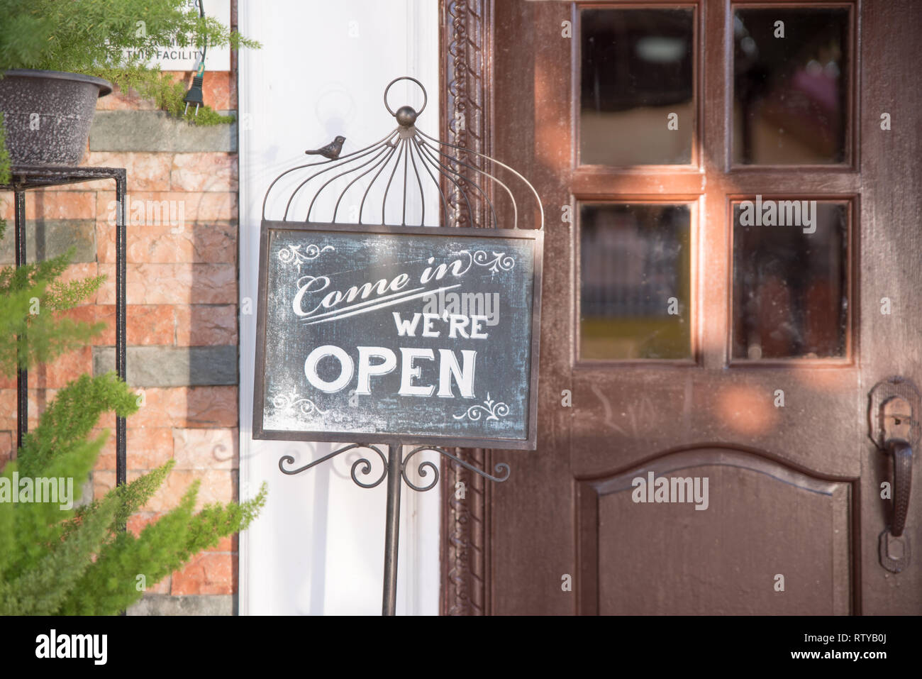 Come in We are Open Signage Stock Photo - Alamy