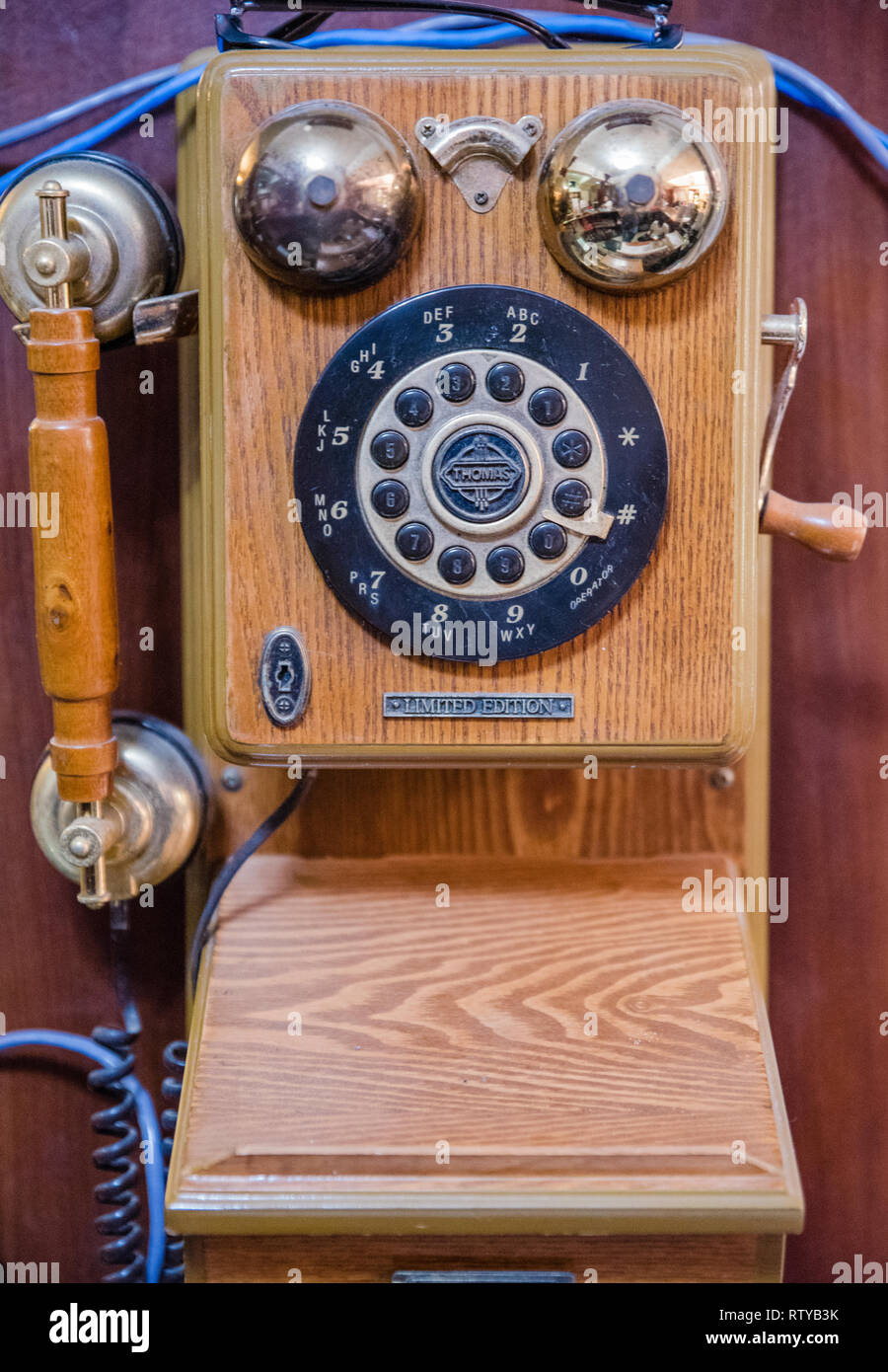 Functional vintage wall mounted telephone unit in good condition Stock ...