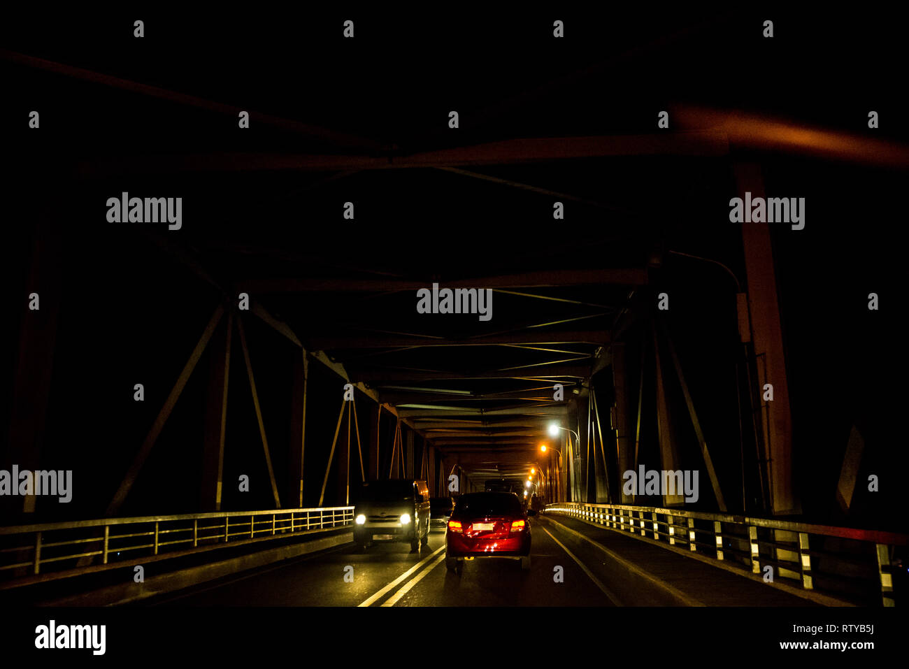 Traveling at night along Mactan Bridge, Cebu, Philippines Stock Photo ...