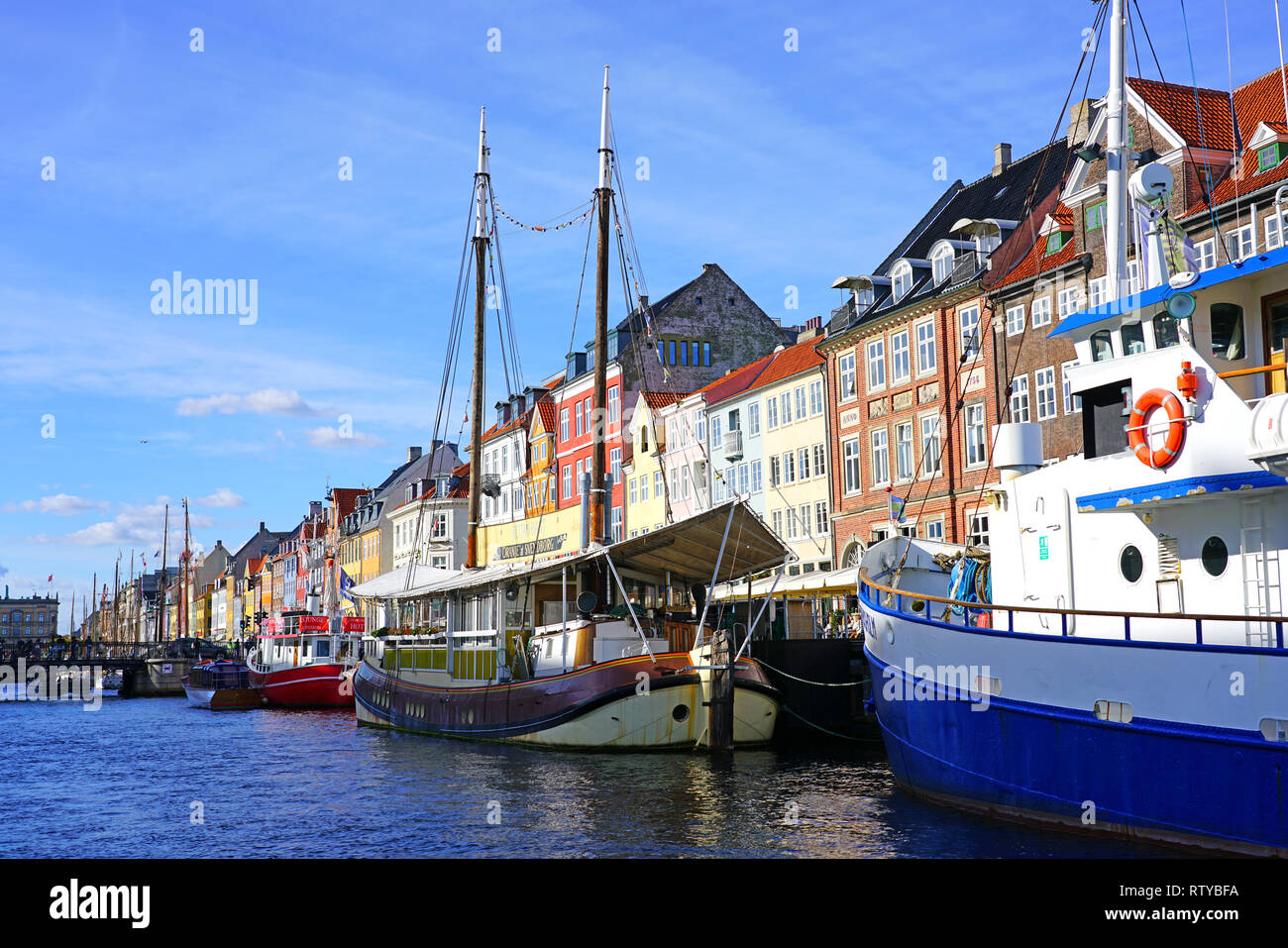 COPENHAGEN, DENMARK -24 SEP 2018- View of colorful buildings lining the ...