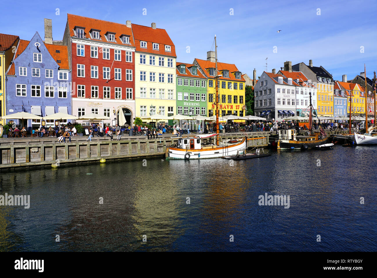 COPENHAGEN, DENMARK -24 SEP 2018- View of colorful buildings lining the ...