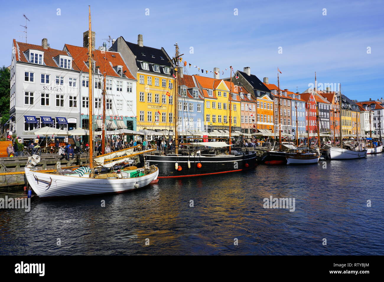 COPENHAGEN, DENMARK -24 SEP 2018- View of colorful buildings lining the ...