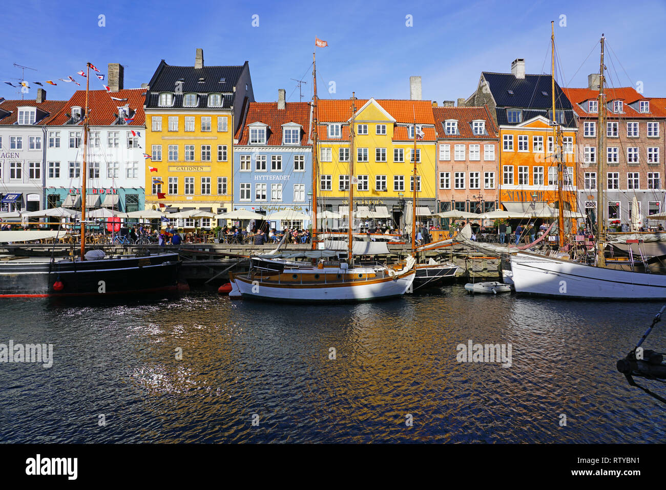COPENHAGEN, DENMARK -24 SEP 2018- View of colorful buildings lining the ...