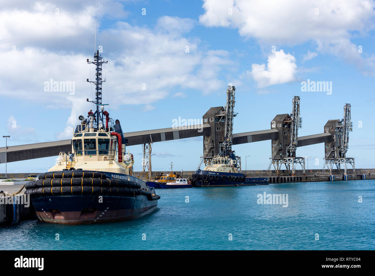Ship loading towers and tug boat in port, Bridgetown, Barbados, Lesser ...