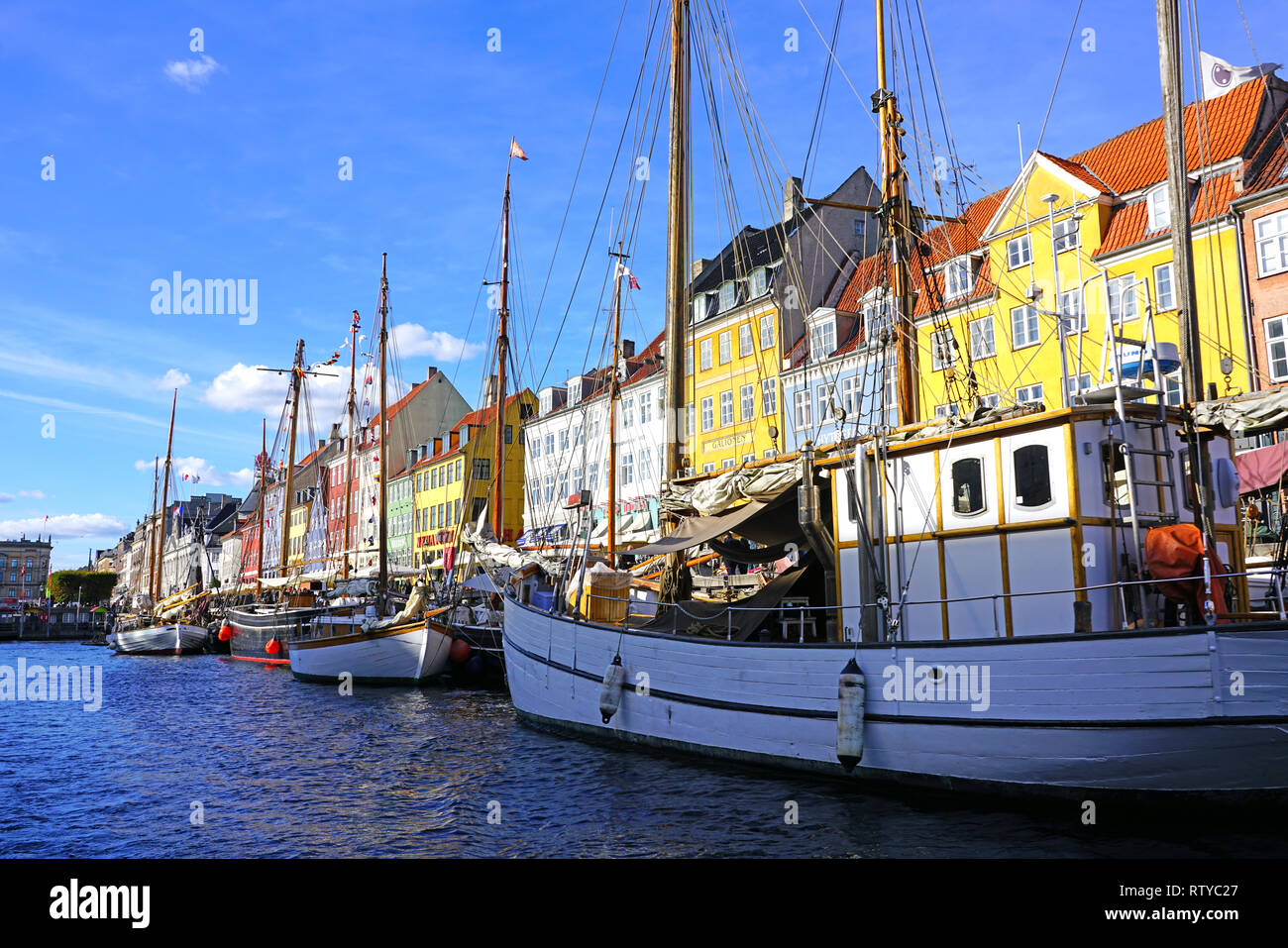 COPENHAGEN, DENMARK -24 SEP 2018- View of colorful buildings lining the ...