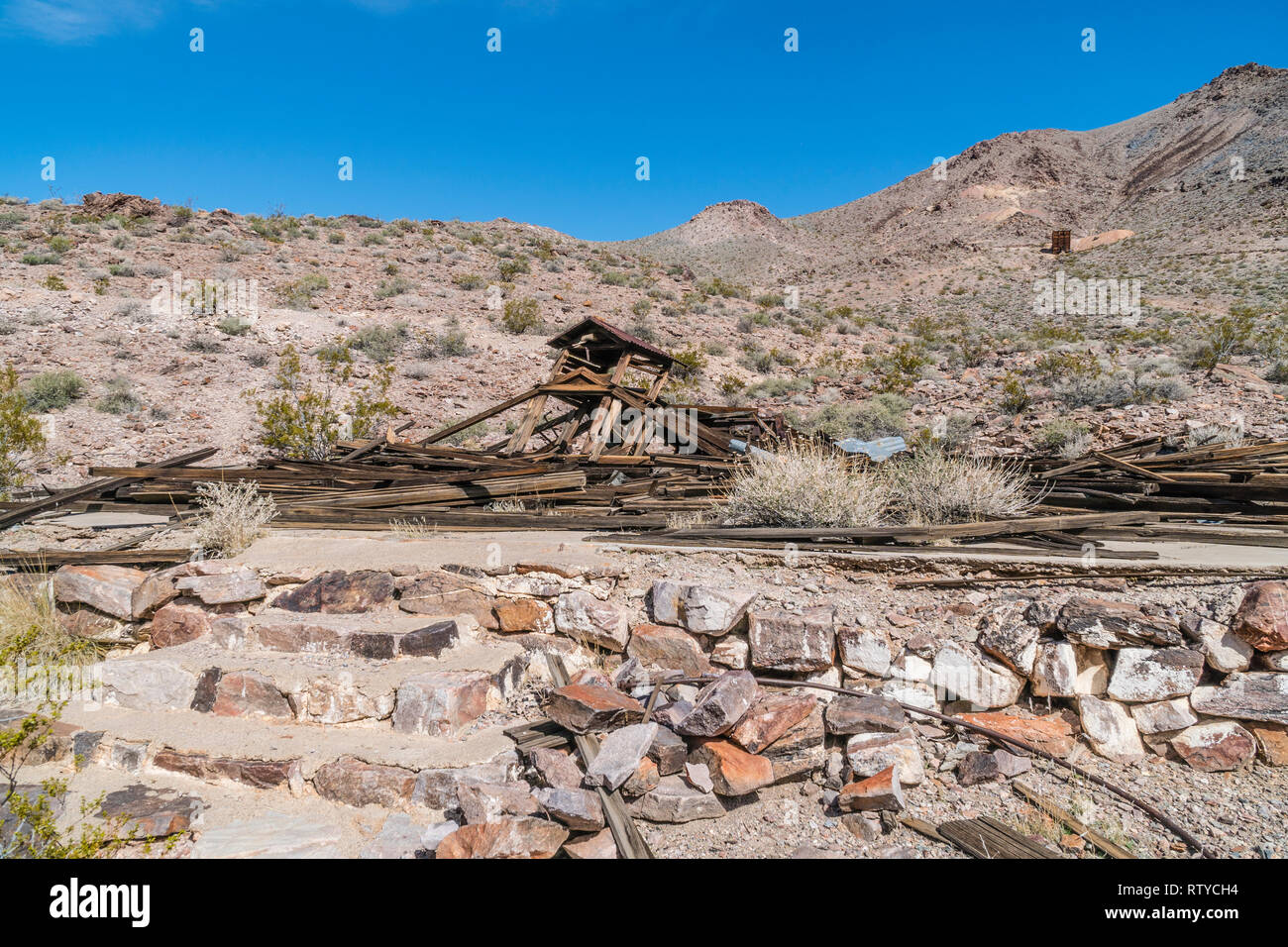 Collapsed building at the Inyo Mine ruins in Death Valley, California ...