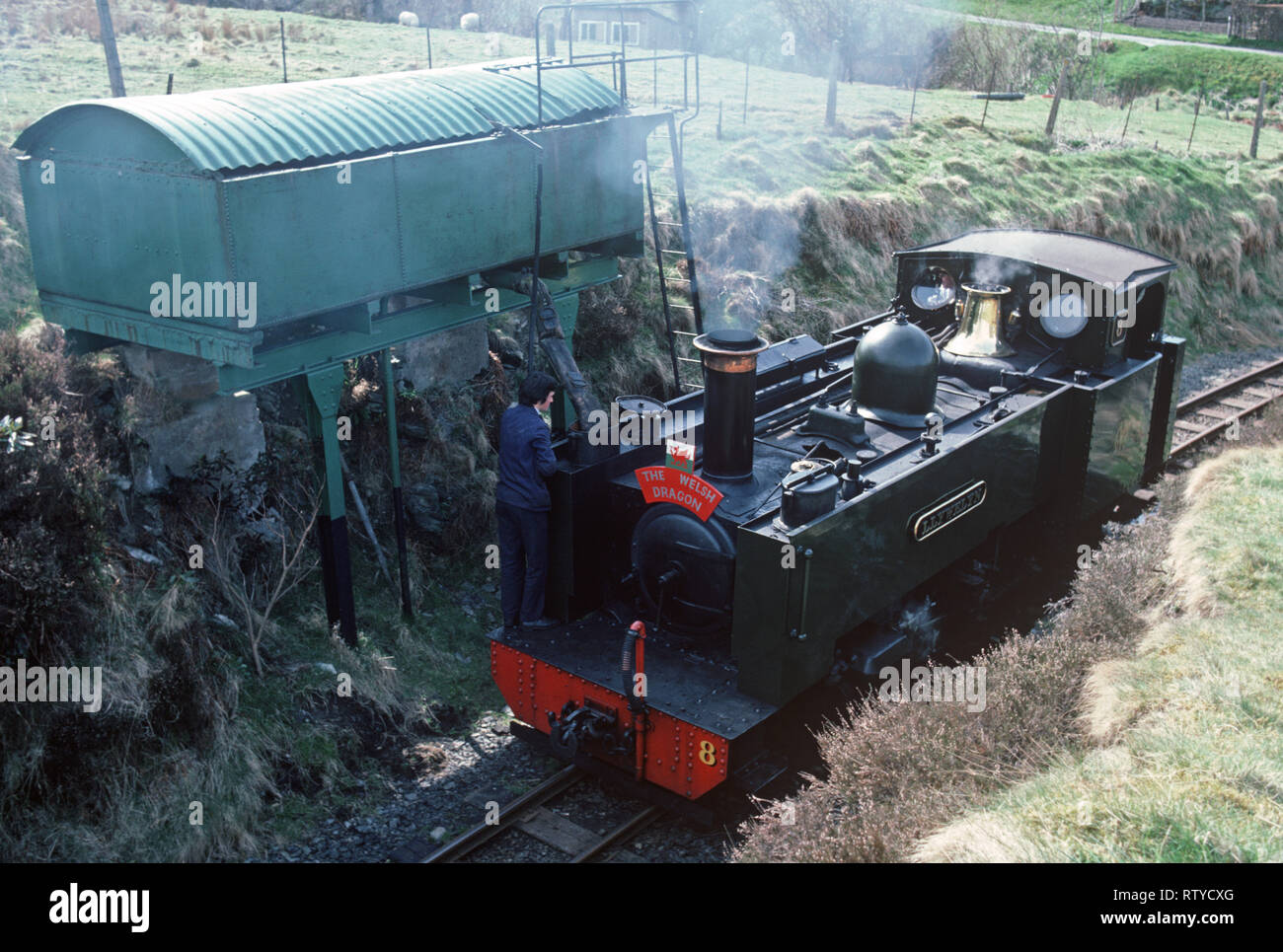 Steam locomotive taking on water at Aberffrwd stop, on the Vale of ...