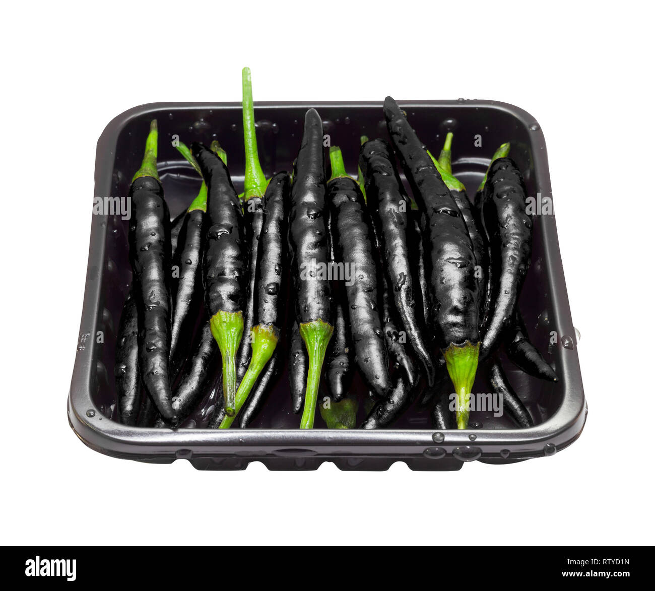 Black chilli peppers, hot pepper in Packing on isolated white ...