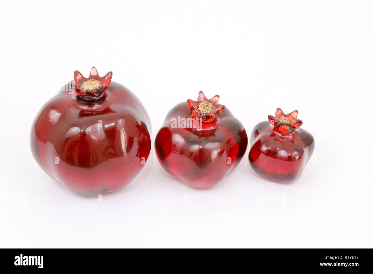 Decorative Red glass pomegranate trinket Stock Photo - Alamy
