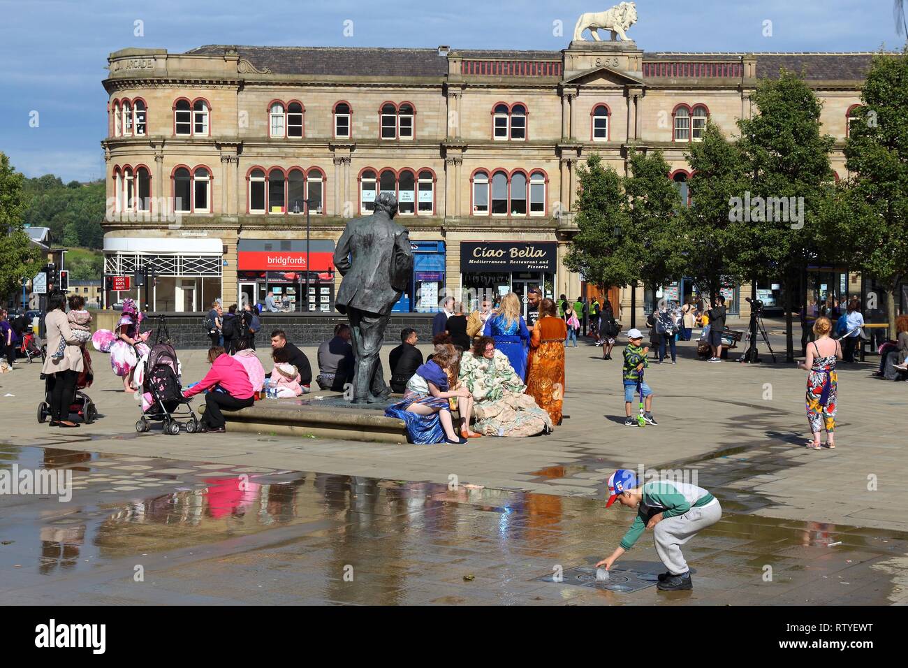 HUDDERSFIELD, UK - JULY 10, 2016: People visit Huddersfield, West ...