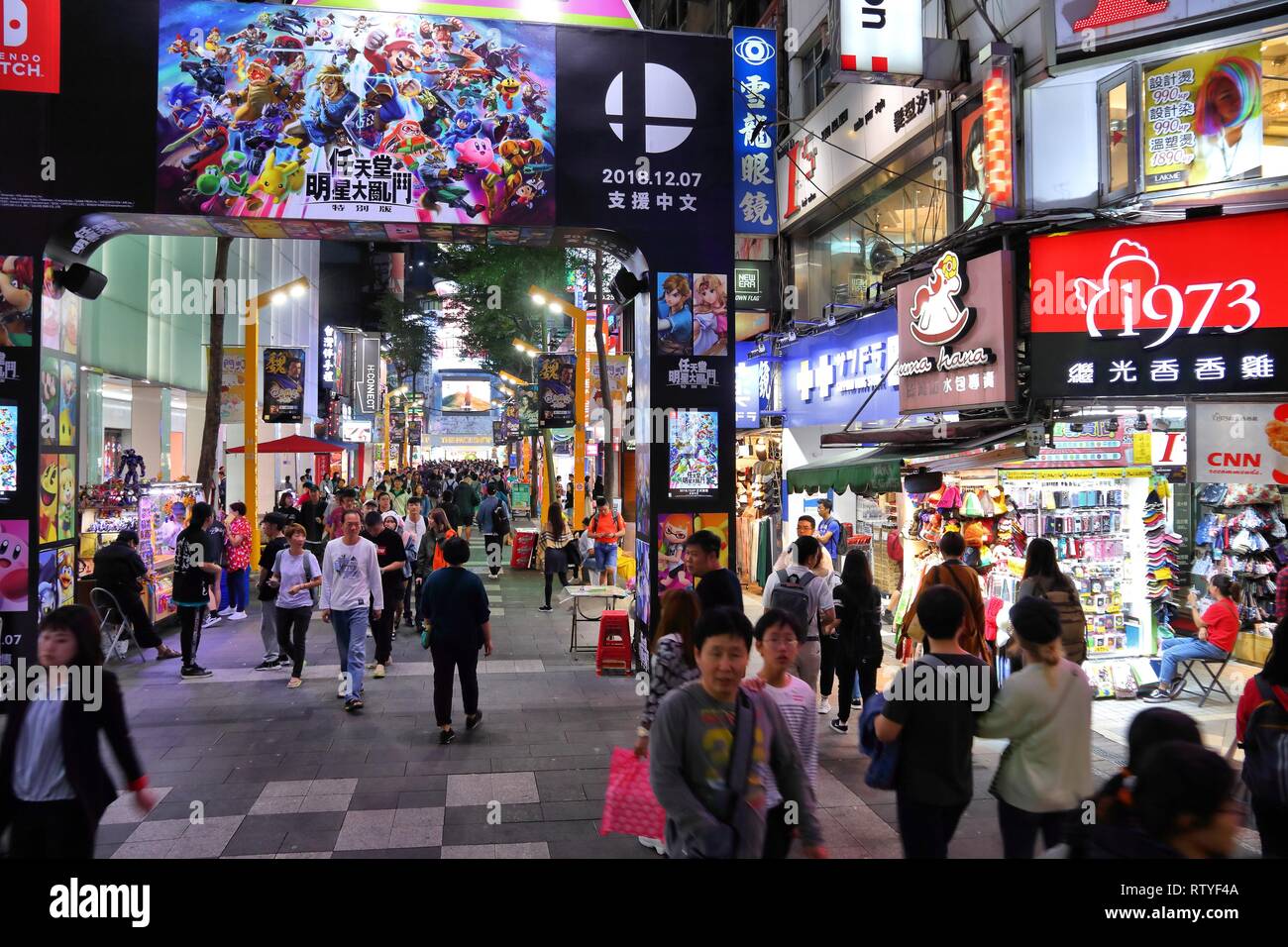 TAIPEI, TAIWAN - DECEMBER 3, 2018: People visit Ximending shopping ...
