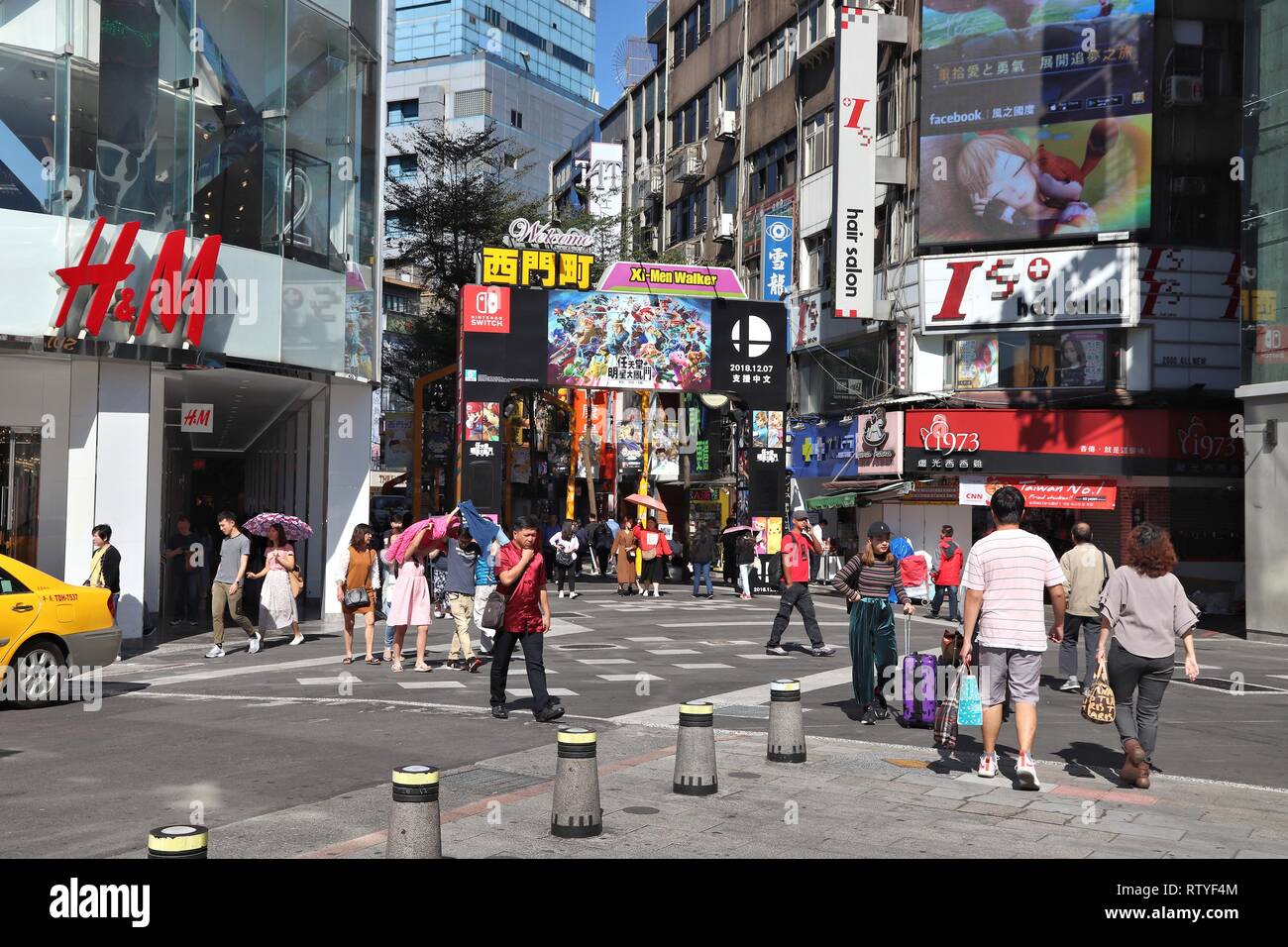 TAIPEI, TAIWAN - DECEMBER 3, 2018: People visit Ximending shopping ...