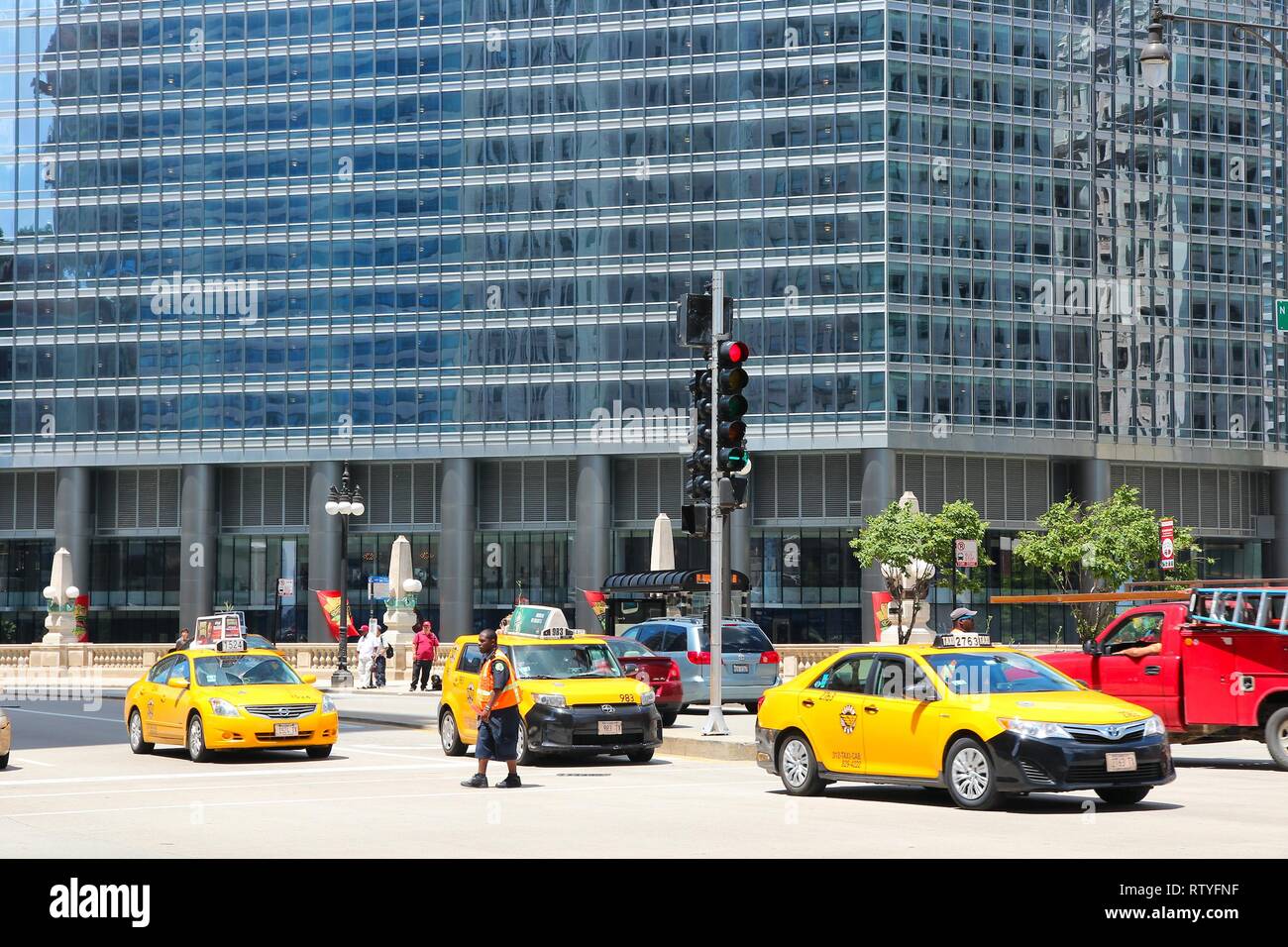 CHICAGO, USA - JUNE 28, 2013: People ride in taxi cabs in Chicago ...