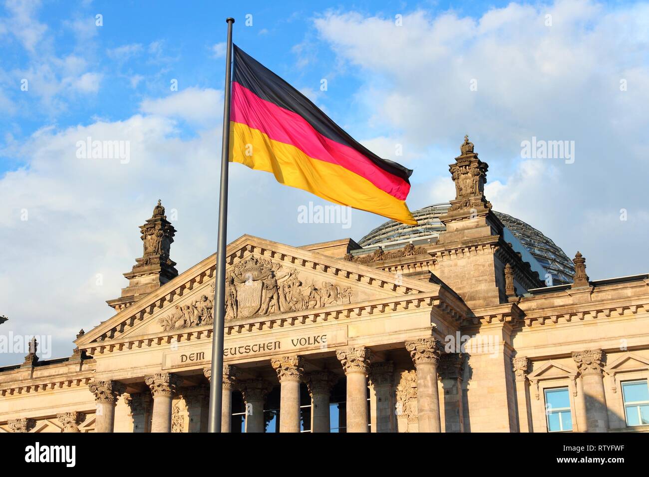 German flag and Reichstag building, German parliament house. Berlin ...