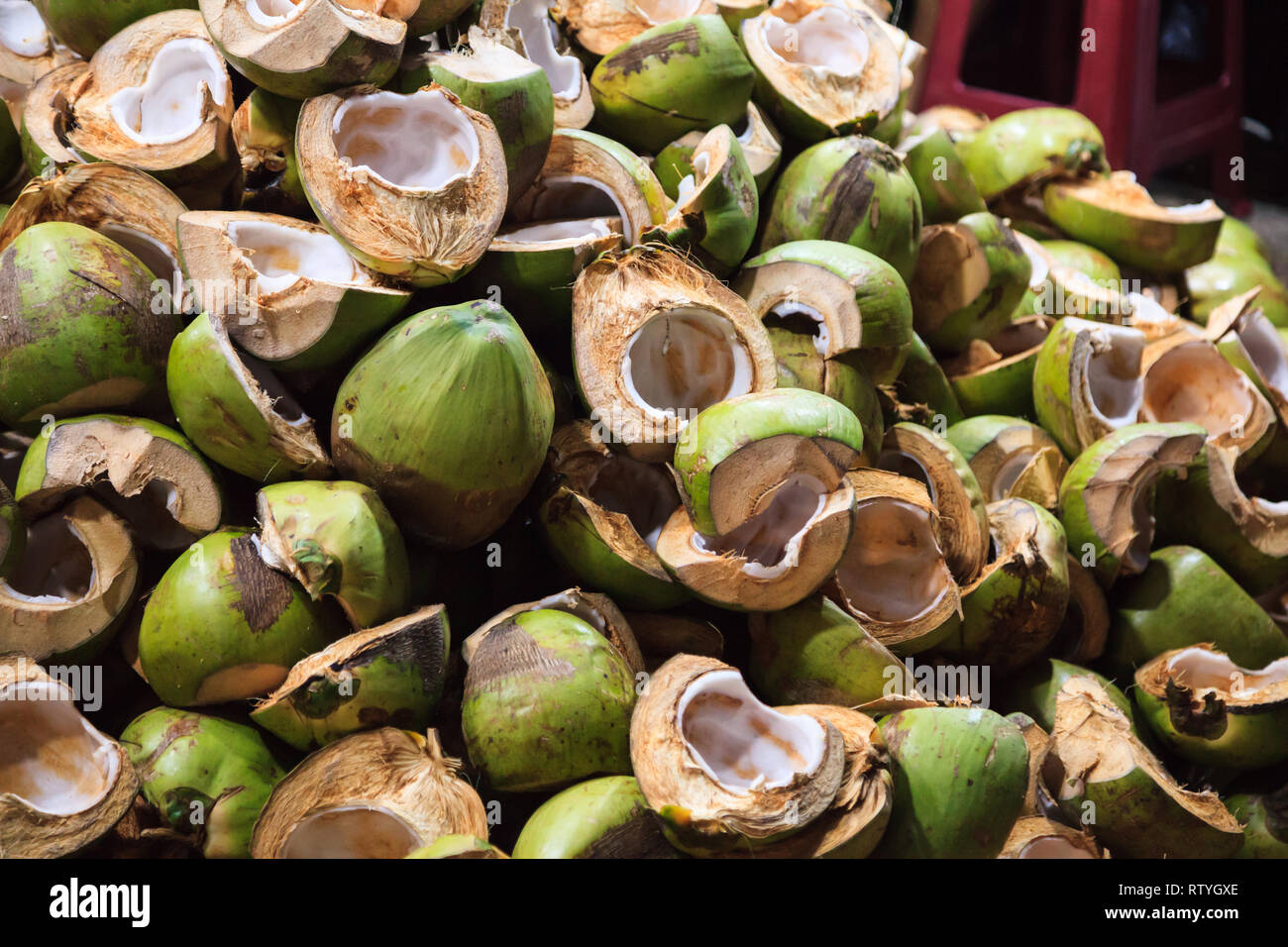natural agricultural waste, chopped coconut fruits, shells and husks in ...