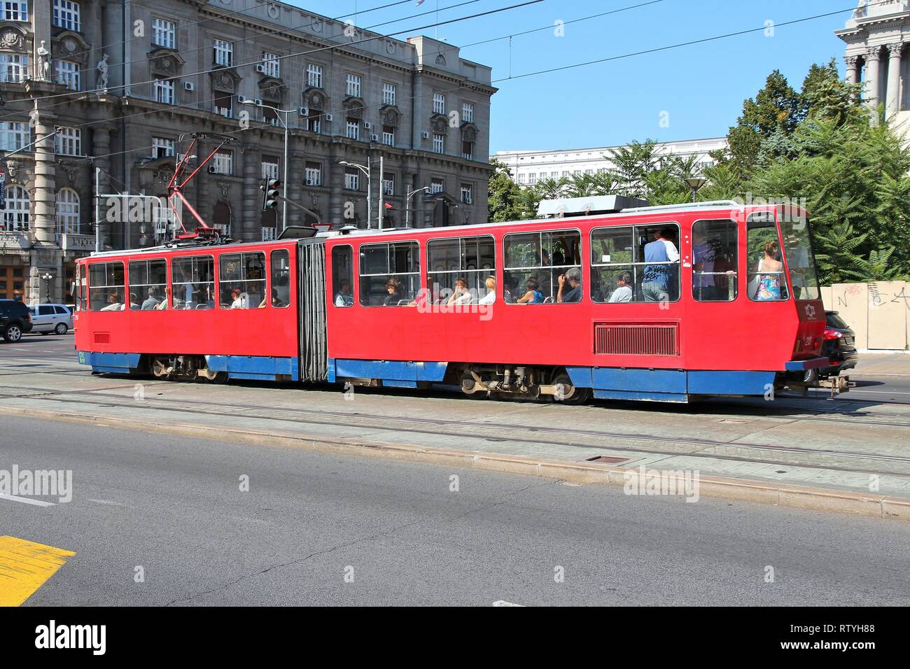 BELGRADE, SERBIA - AUGUST 15, 2012: People ride tram in Belgrade ...