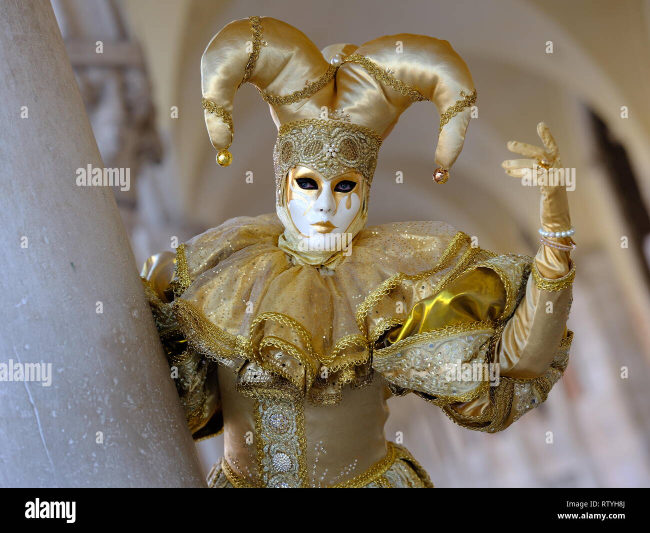 Venice Carnival Mask Festival 2019 Gold Jester Costume Stock Photo - Alamy