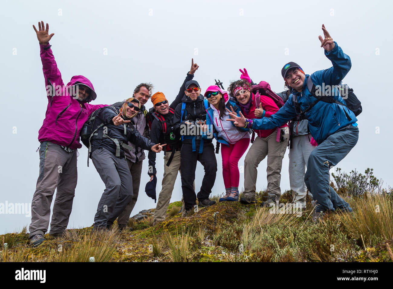 Papallacta, Ecuador, July 2018: A group of mountaineers celebrate the ...