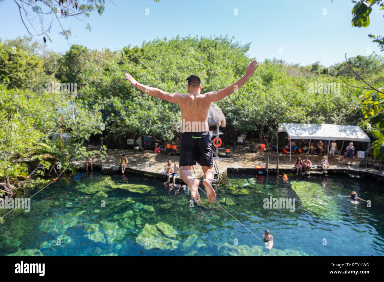 Blue lagoon cliff jump hi-res stock photography and images - Alamy
