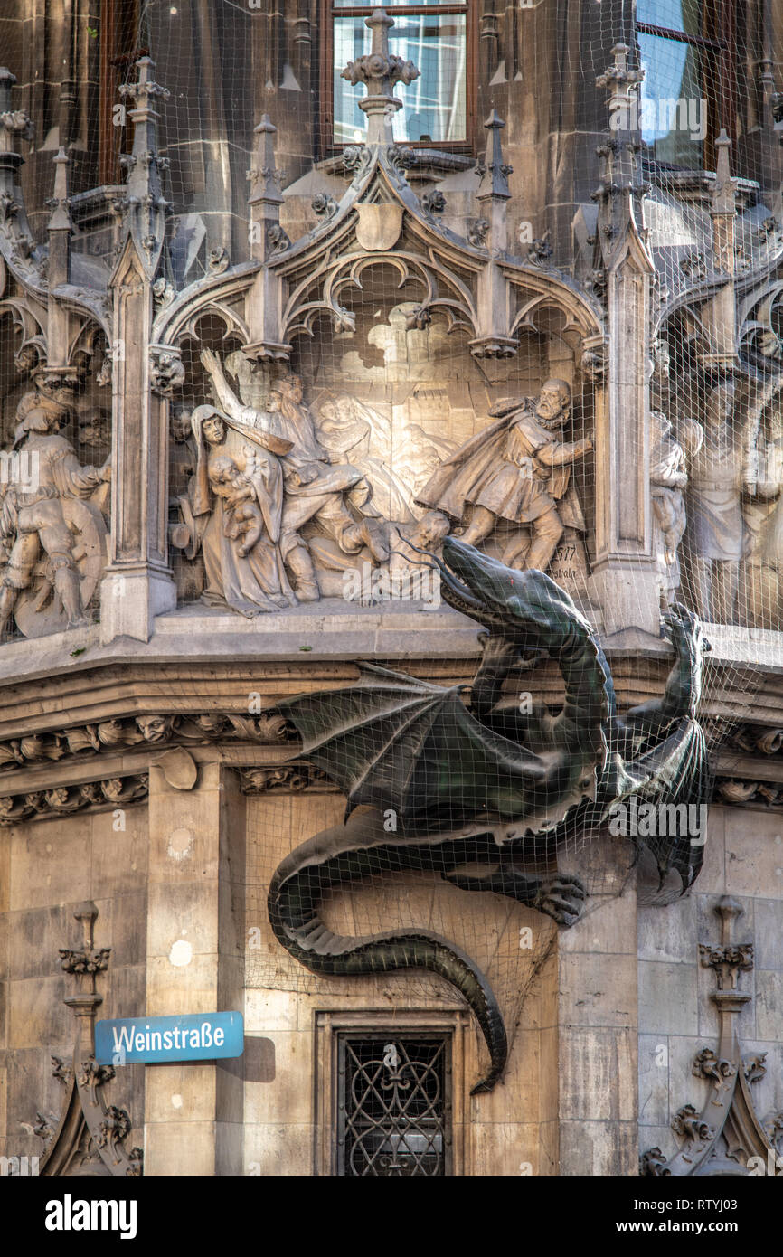 A dragon statue attached to Ratskeller restaurant in Munich,Germany ...