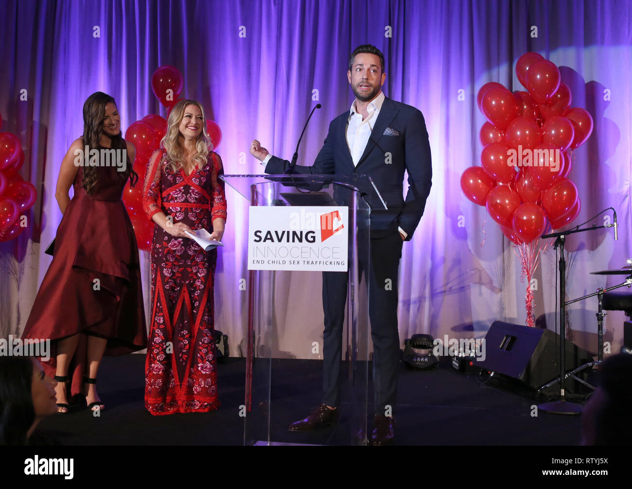 Hollywood, USA - MARCH 2: Amber Davies, Kim Biddle, Zachary Levi, at ...