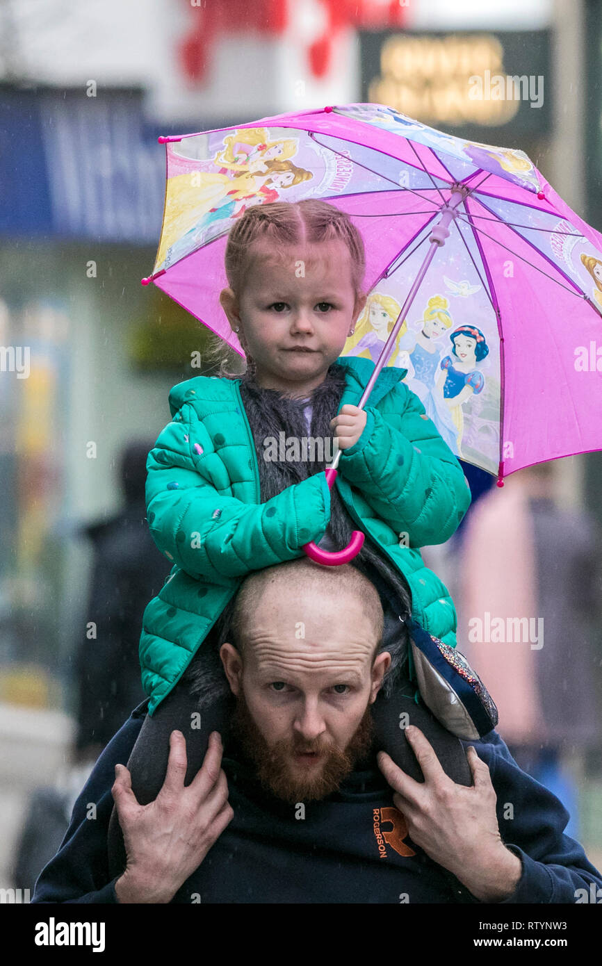 Wet and windy day in preston city centre hi-res stock photography and ...
