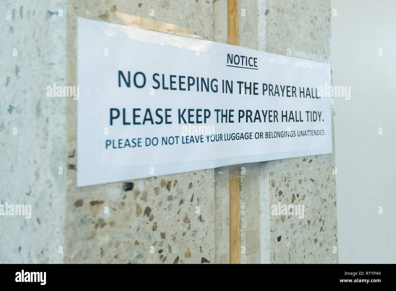 London, UK. 3 March 2019. A sign affixed to the wall of the prayer hall ...
