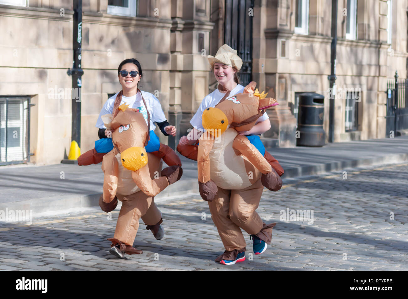 Female athletes in costumes hi-res stock photography and images - Alamy