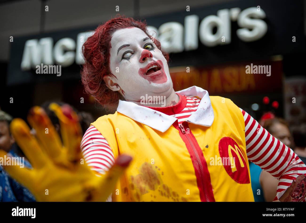 Curitiba, Brazil. 03rd Mar, 2019. Participants dressed as zombies meet ...