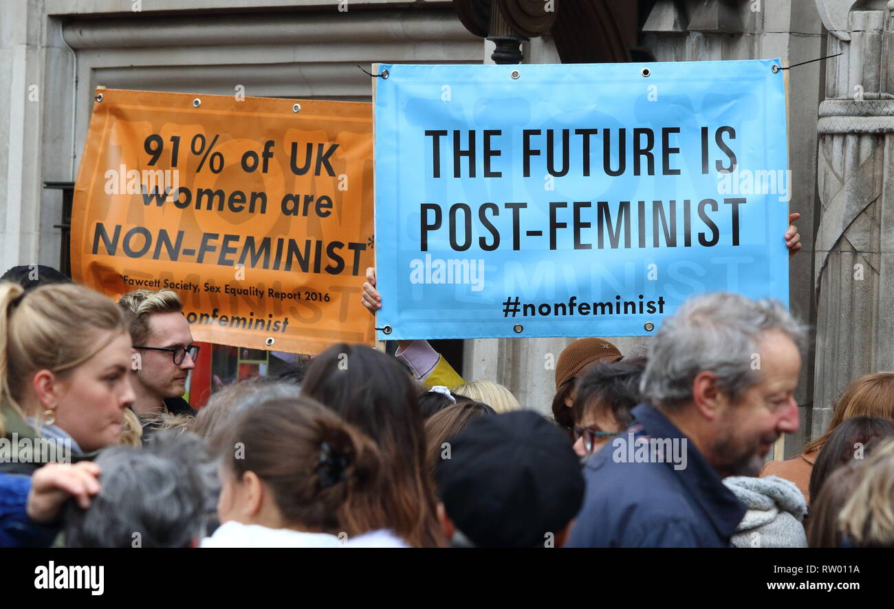 London, UK. 3rd Mar, 2019. People seen holding placards during a ...