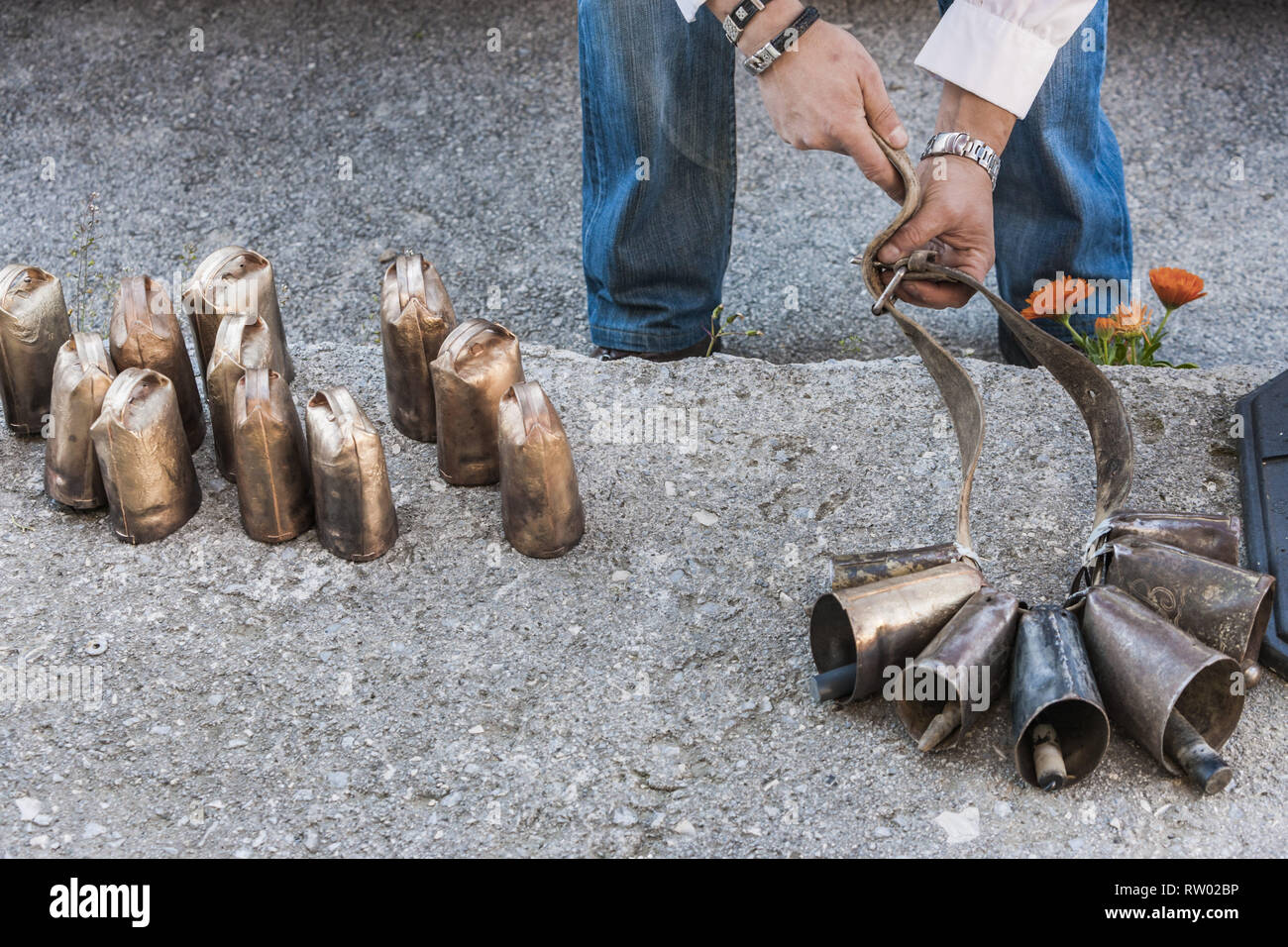 Fresnedo, Cantabria, Spain. 2nd Mar, 2019. A man prepares the cow bells ...