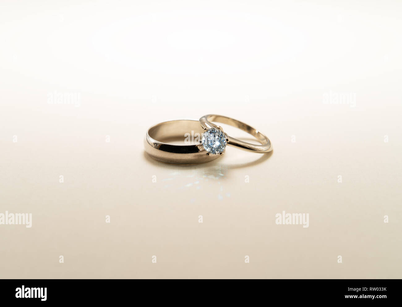 Gold wedding rings with shadow hi-res stock photography and images - Alamy