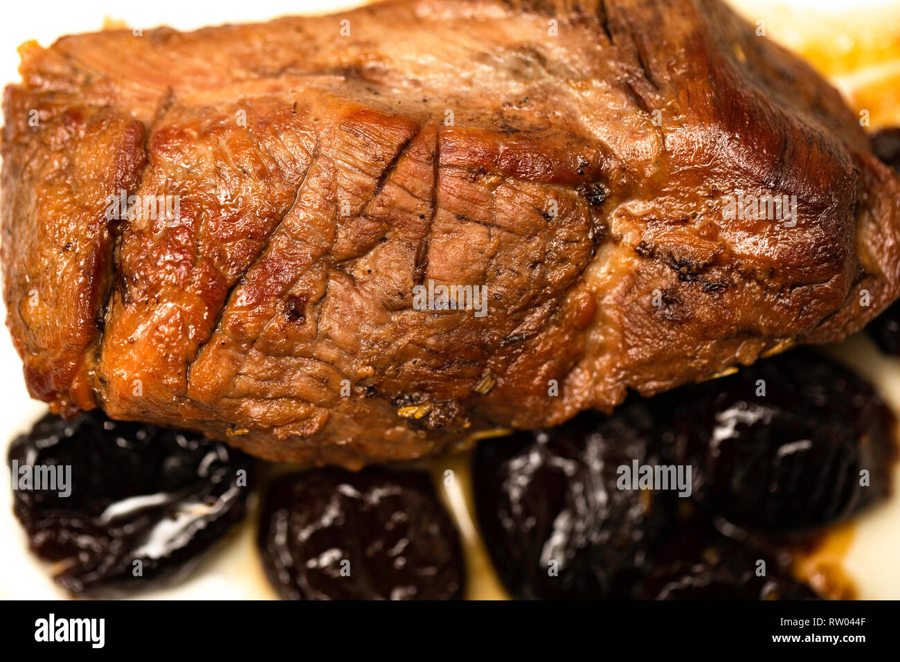 Roasted duck with prunes. Meat texture, baked dishes Stock Photo - Alamy