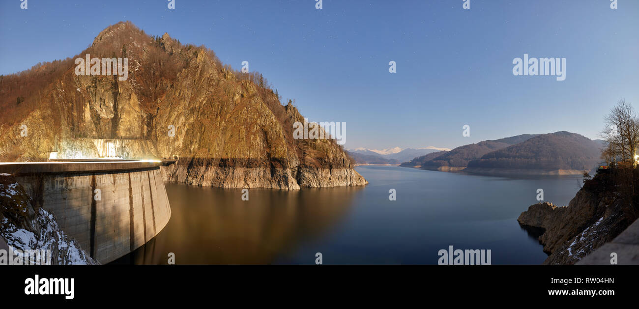 Landscape with dam lake between mountains Stock Photo - Alamy