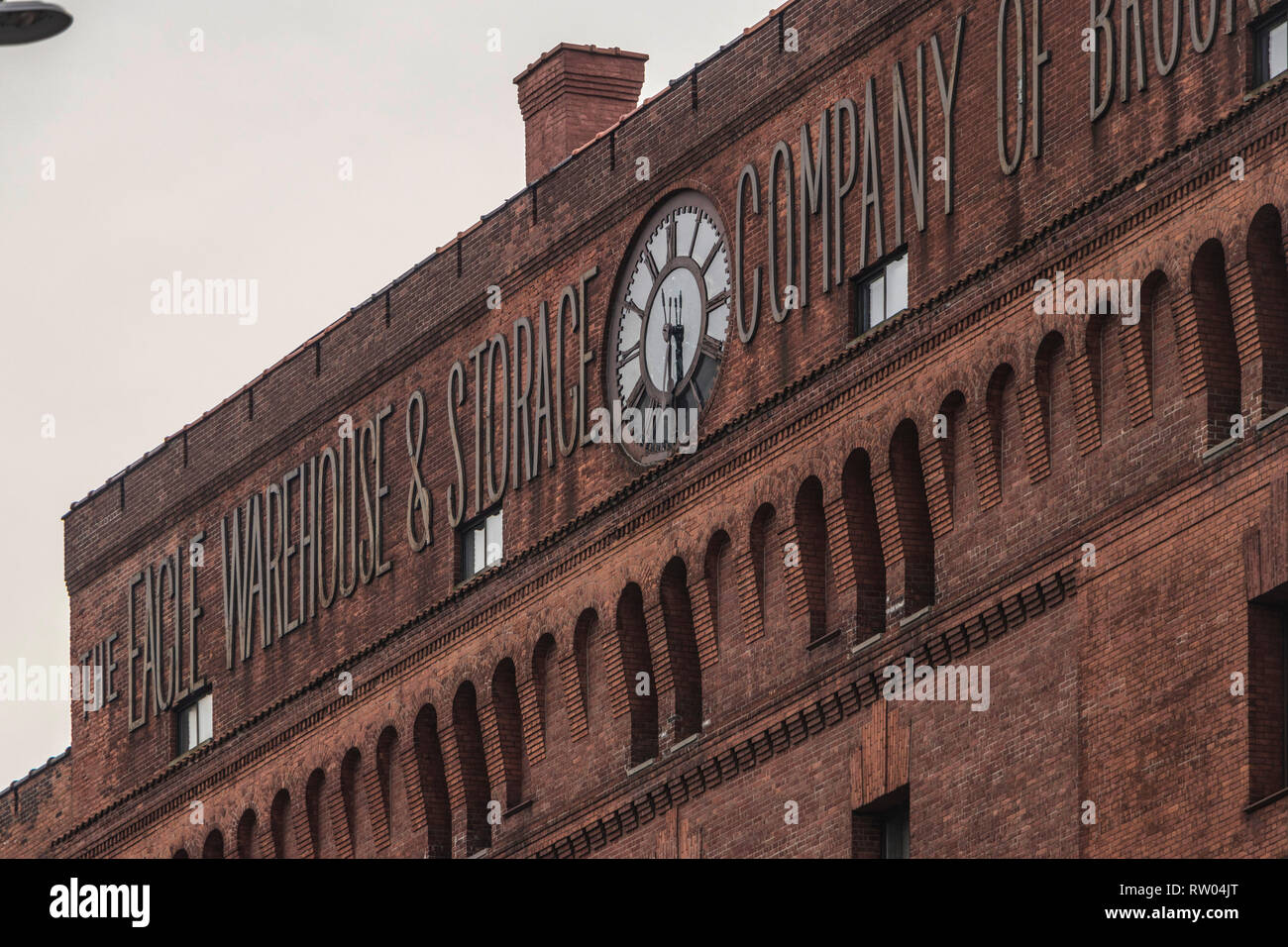 Eagle warehouse and storage co in brooklyn with clock Stock Photo - Alamy