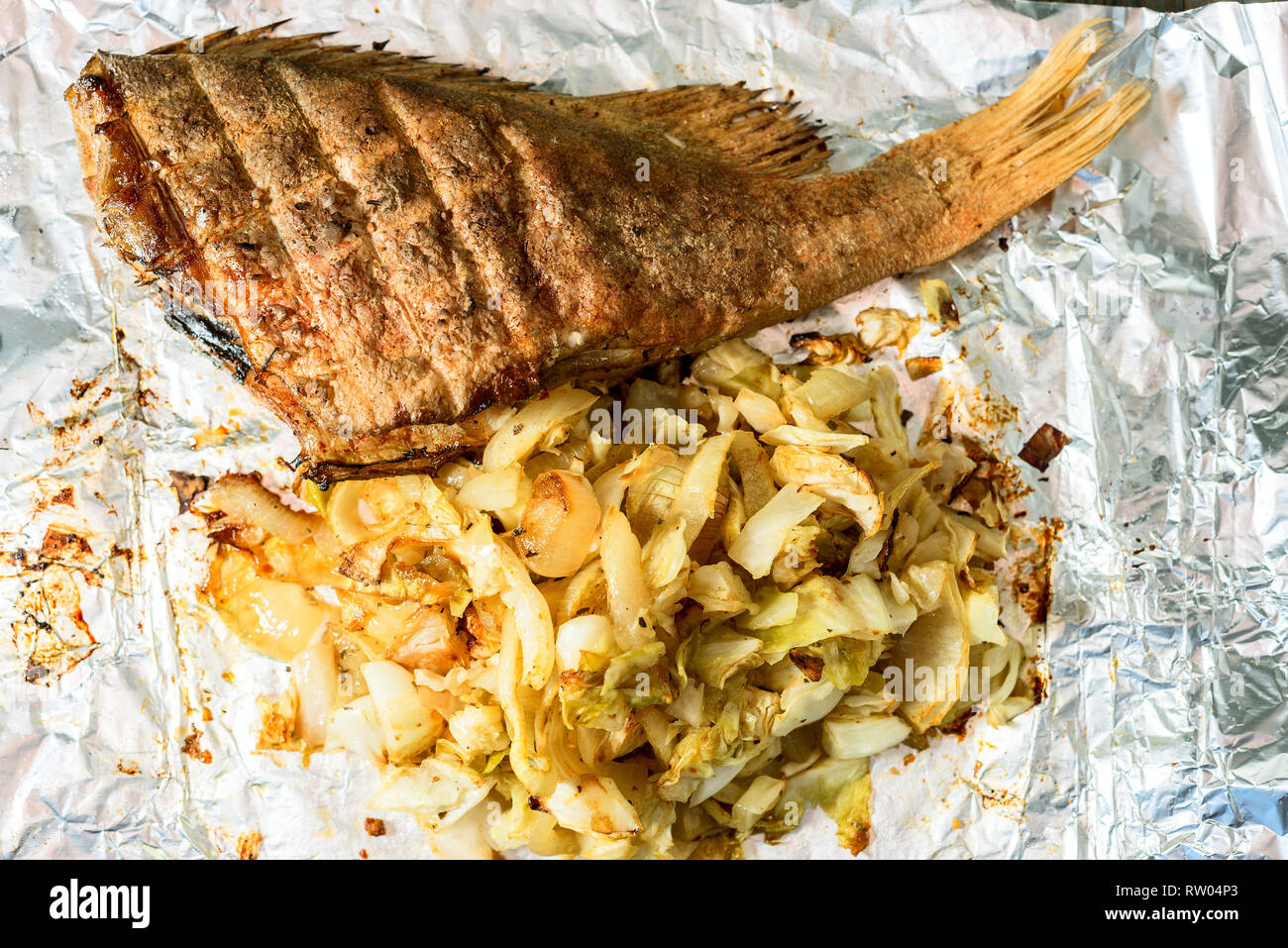Fish vegetables baked in hi-res stock photography and images - Alamy