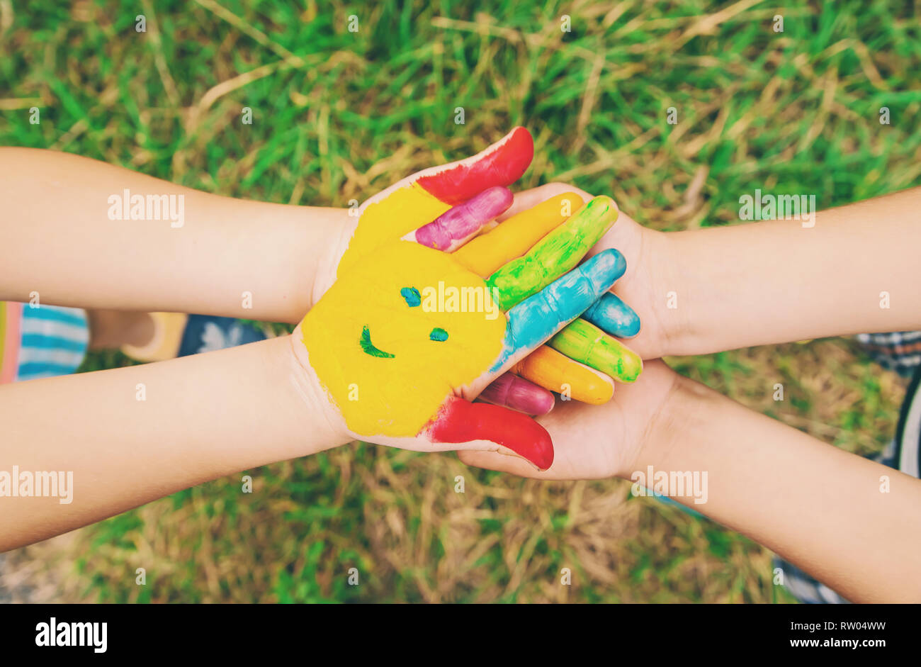 children hands in colors. Summer photo. Selective focus. nature Stock ...