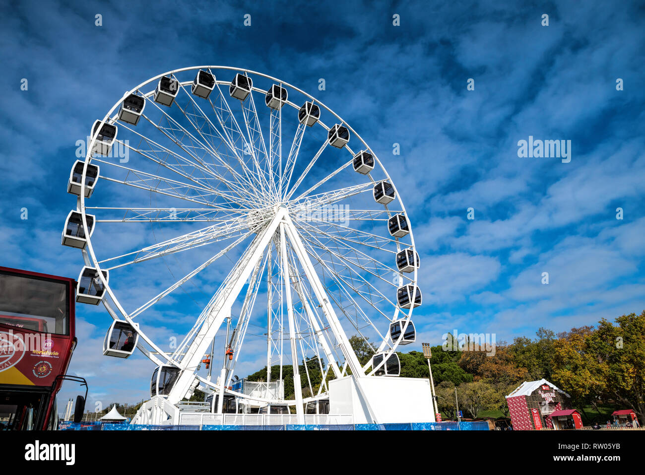 Big ferris wheel against the blue sky Stock Photo - Alamy