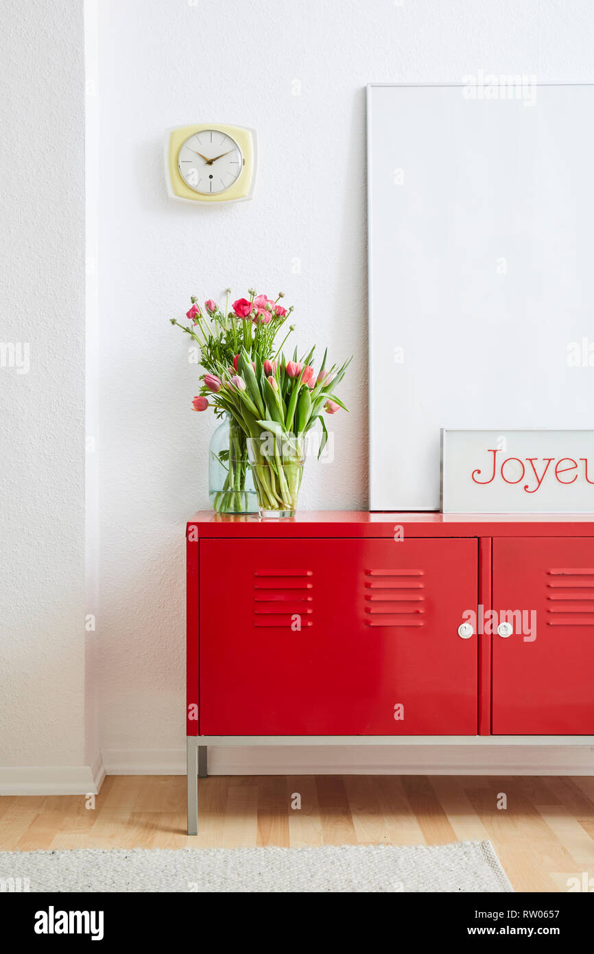 minimalist concept frames flowers and red metal locker Stock Photo - Alamy