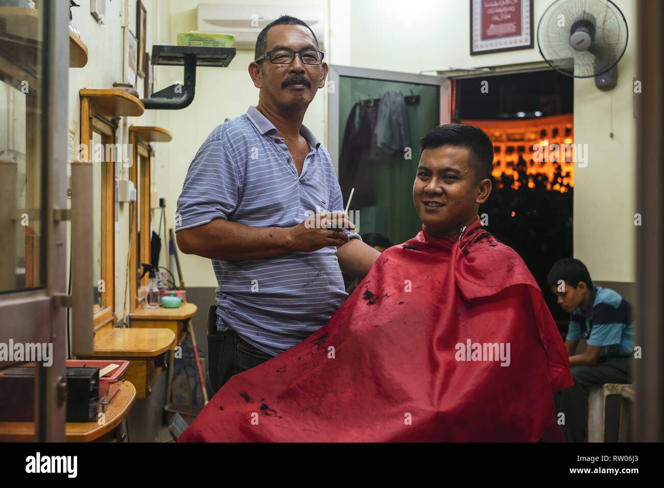 KUCHING / SARAWAK / MALAYSIA / JUNE 2014: Barber shop in the streets of ...