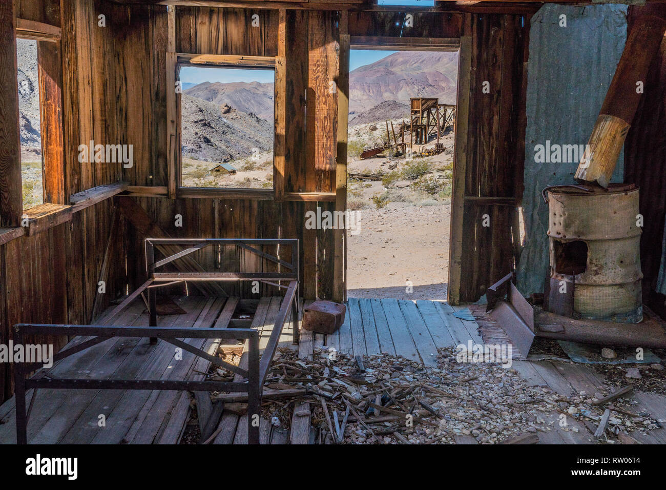 Looking out from inside a ruined building with a handmade 55 gallon ...