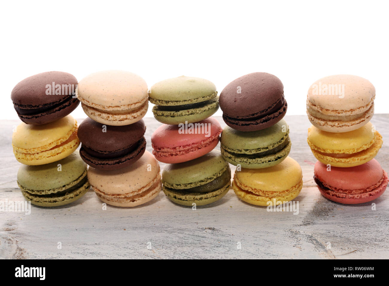 Sweet and colourful french macaroons or macaron on white background ...