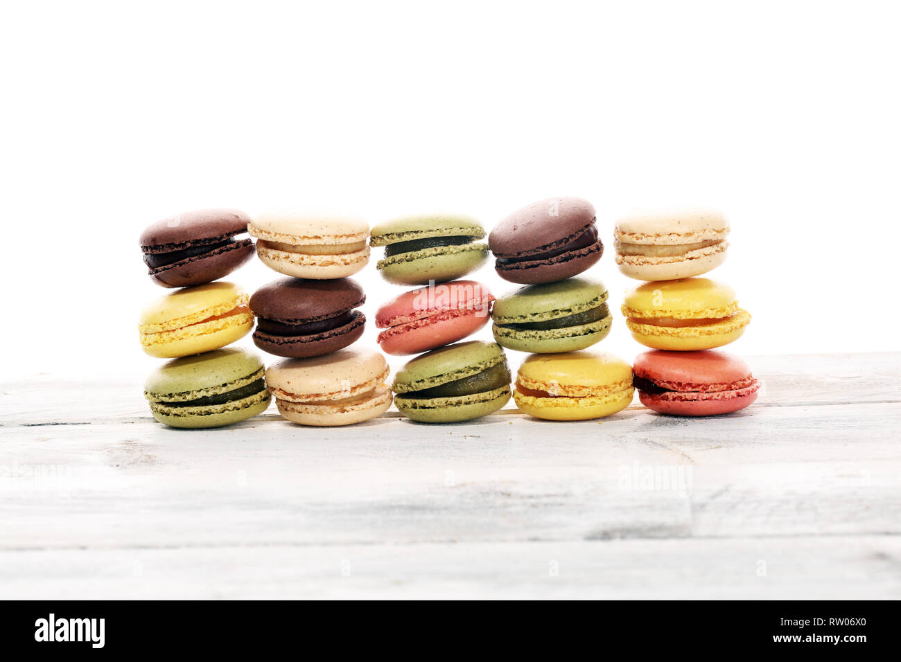 Sweet and colourful french macaroons or macaron on white background ...