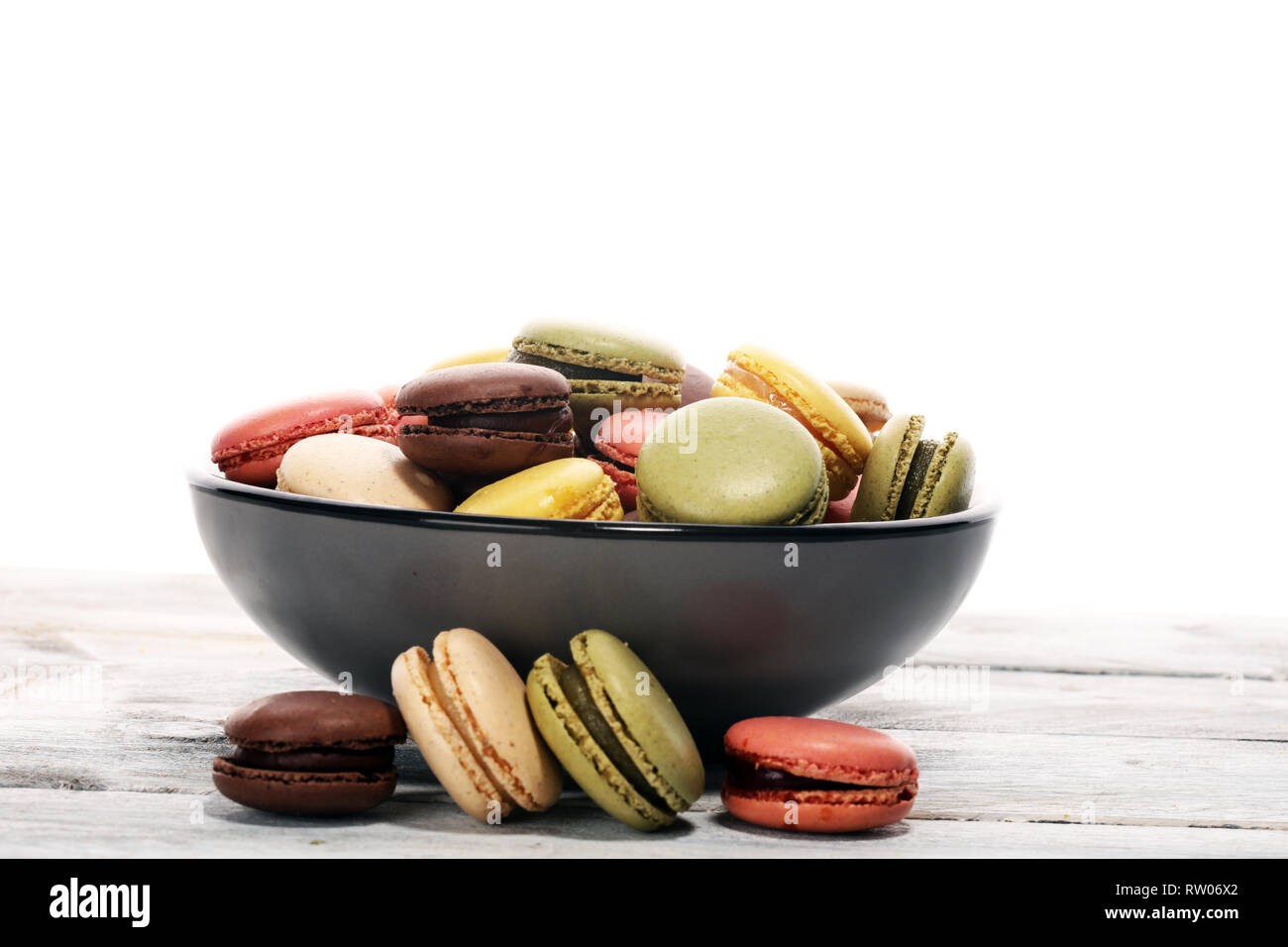 Sweet and colourful french macaroons or macaron on white background ...