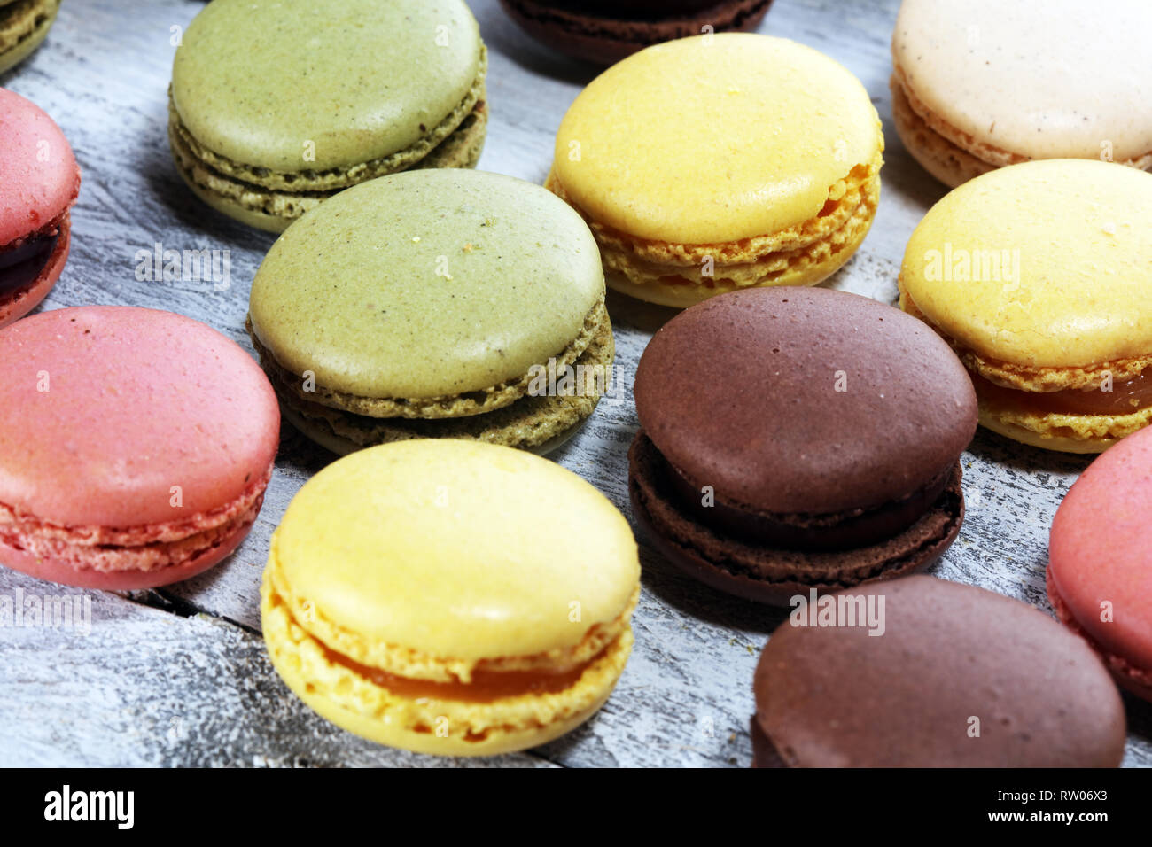 Sweet and colourful french macaroons or macaron on white background ...