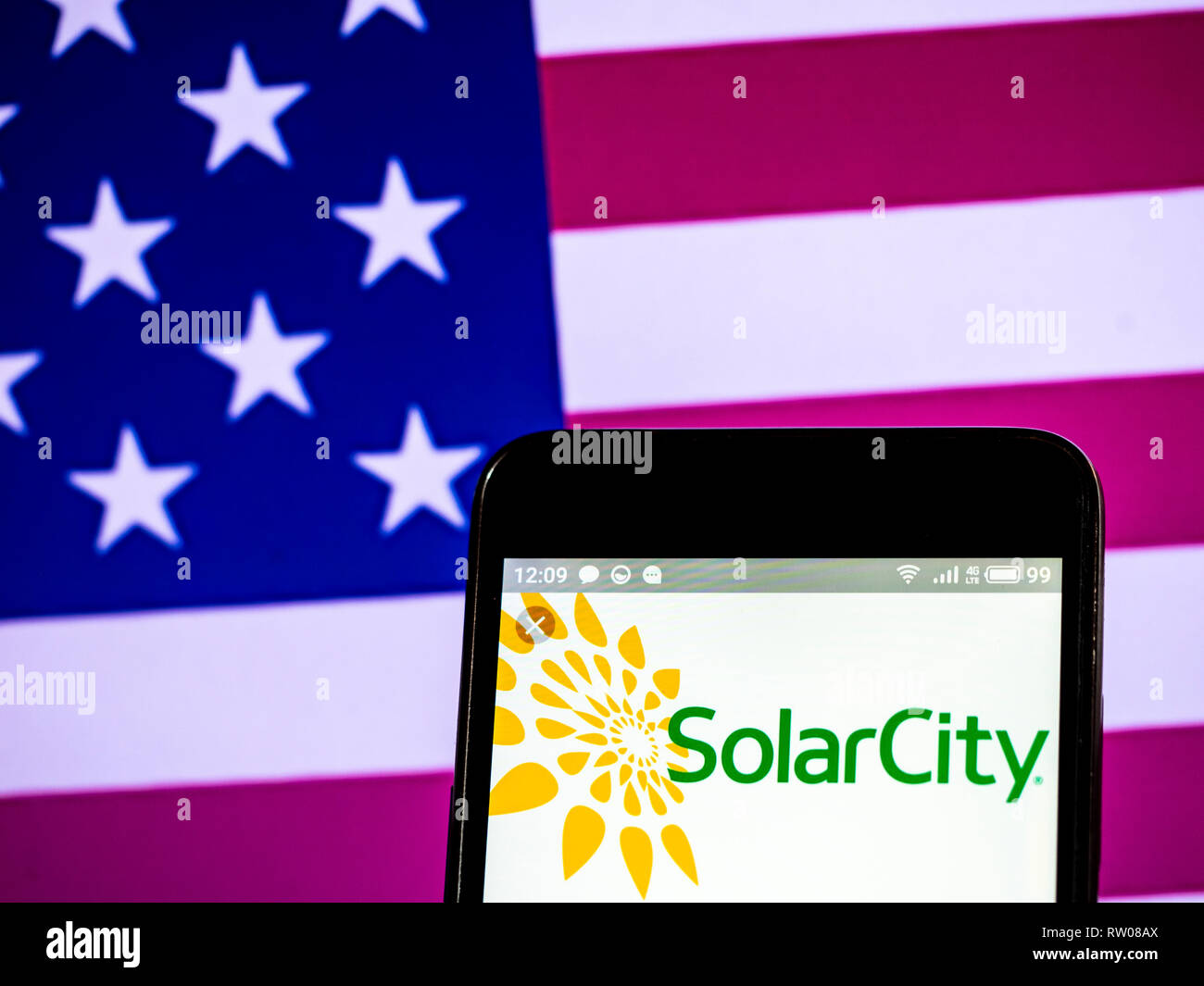 SolarCity energy company logo seen displayed on smart phone Stock Photo ...